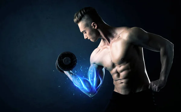 Fit athlete lifting weight with blue muscle light concept Stock Photo ...
