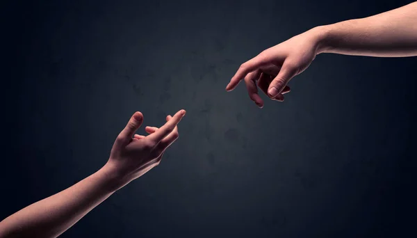 Hand about to touch another one Stock Photo by ©ra2studio 132340244