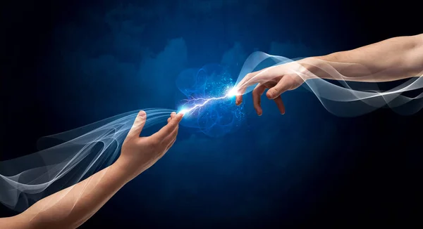 Hands connecting through fingers in space - Stock Image - Everypixel