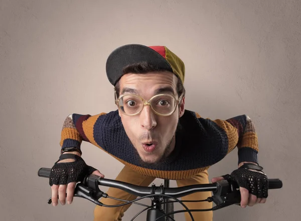 Crazy cyclist with empty background Stock Photo by ©ra2studio 196402150