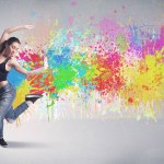 Modern street dancer jumping with colorful paint splashes Stock Photo ...