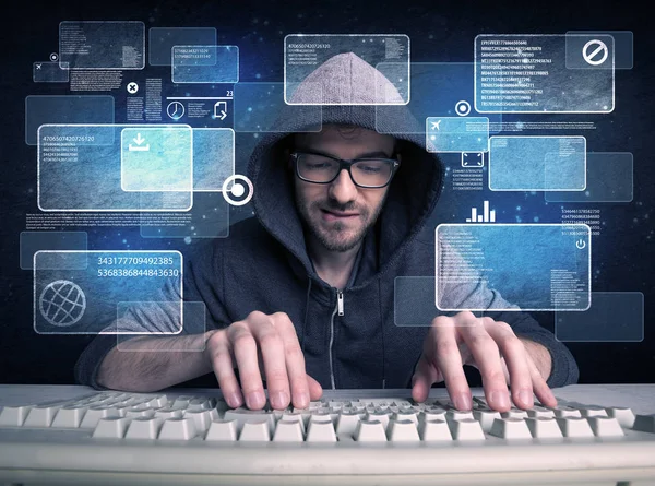 Nerd with glasses hacking websites Stock Photo by ©ra2studio 126696442