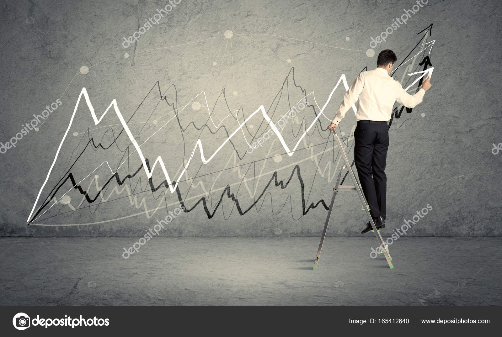 Man on ladder drawing lines Stock Photo by ©ra2studio 165412640