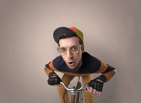 Crazy cyclist with empty background Stock Photo by ©ra2studio 196402150