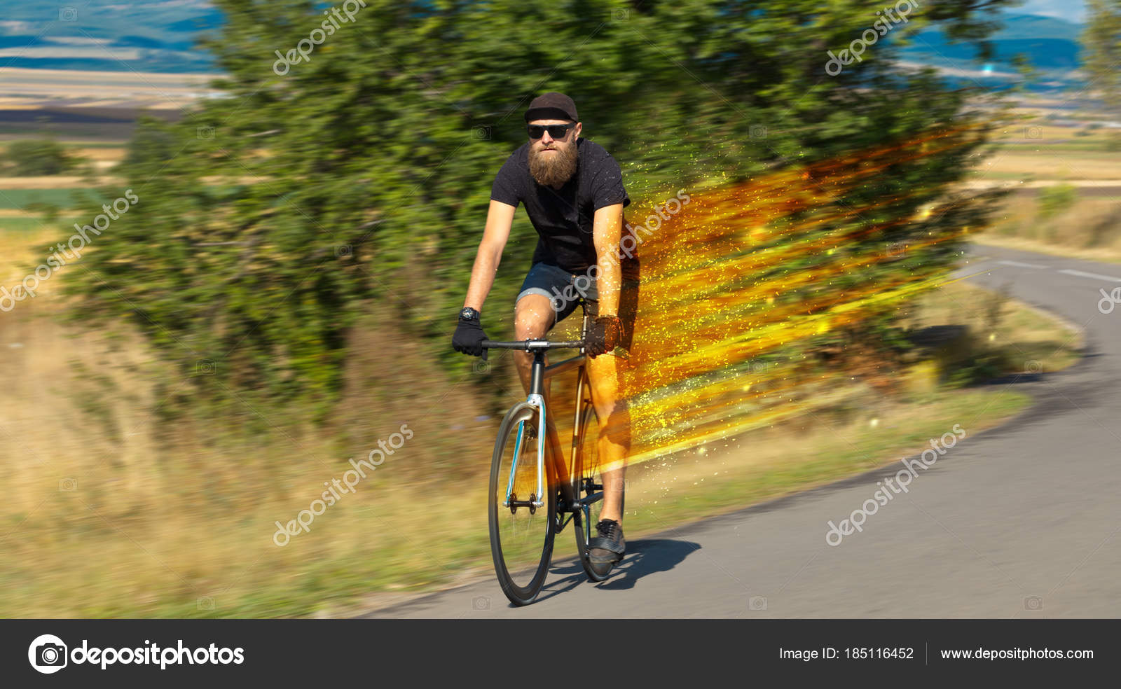 Young riding bicycle in nature Stock Photo by ©ra2studio 185116452