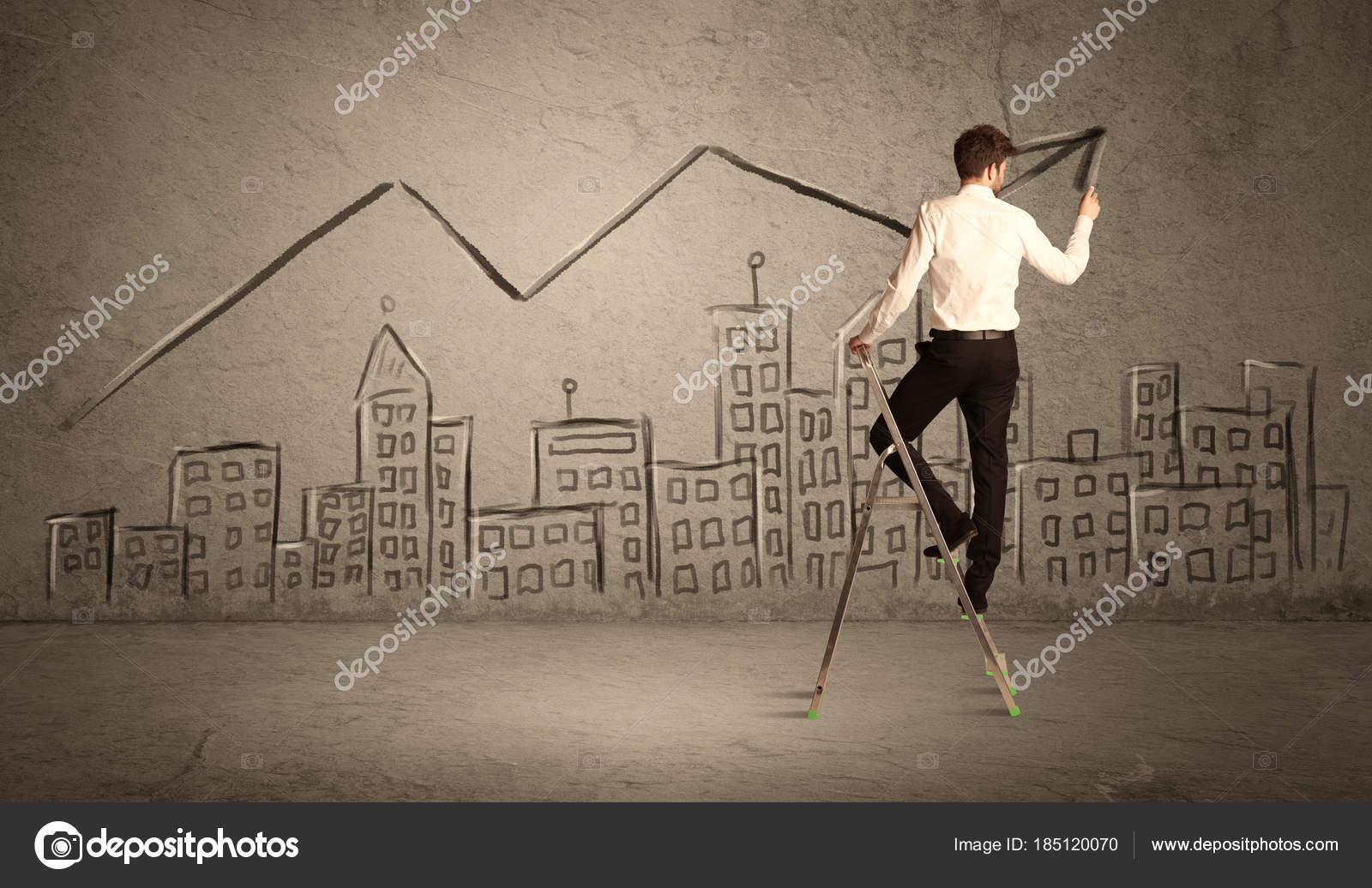 Man drawing line above the city Stock Photo by ©ra2studio 185120070
