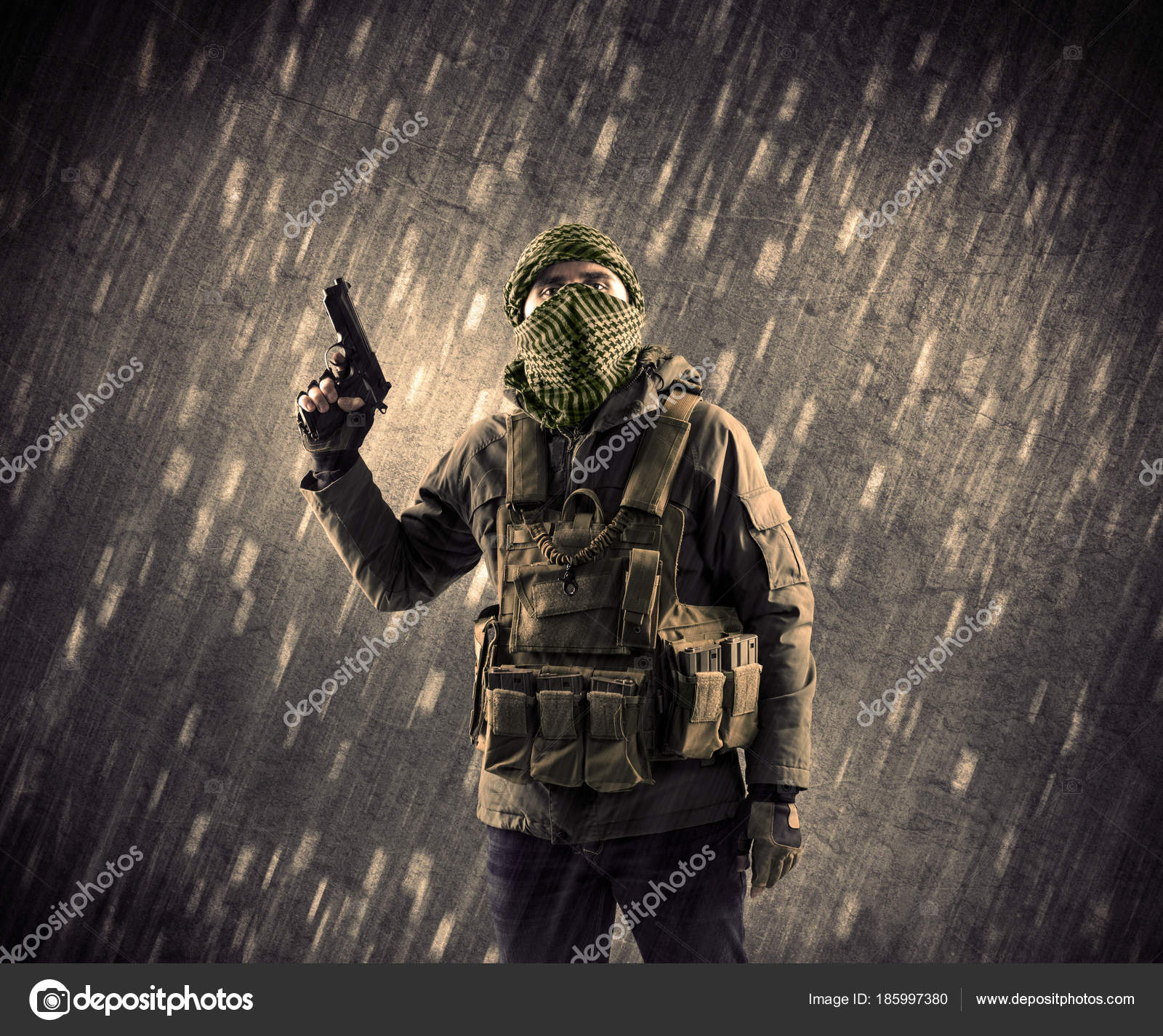 Armed terrorist man with mask on rainy background — Stock Photo ...