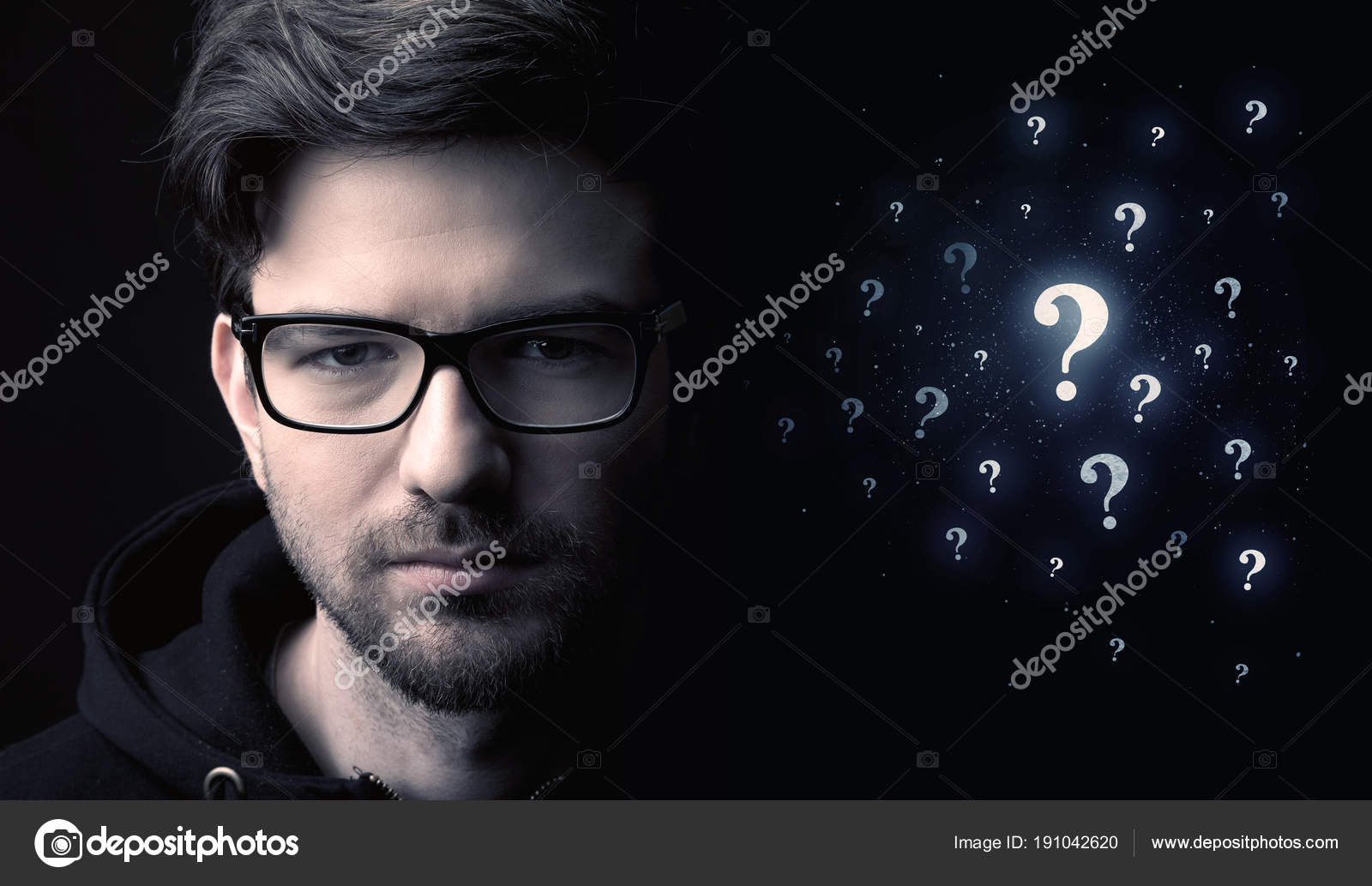 Man with many question mark near him Stock Photo by ©ra2studio 191042620