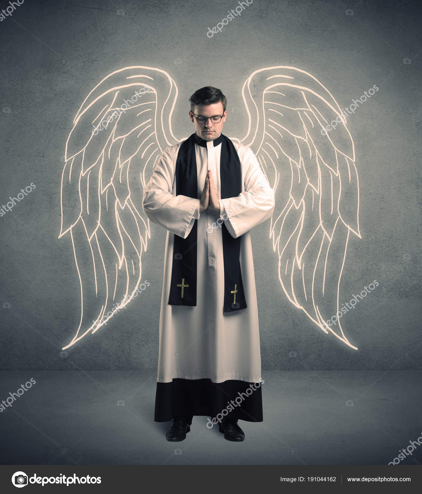 Young priest in giving his blessing — Stock Photo © ra2studio #191044162