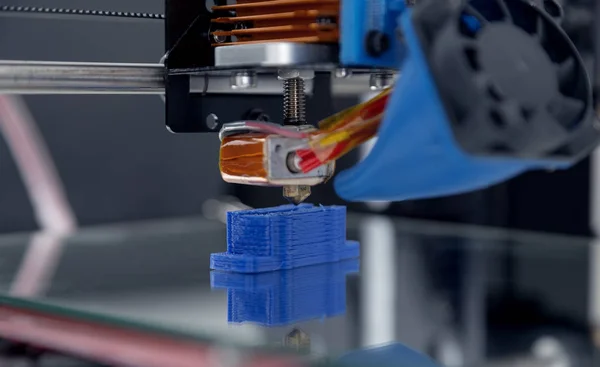 3d printer mechanism working during the processes. Modern 3D printing ...