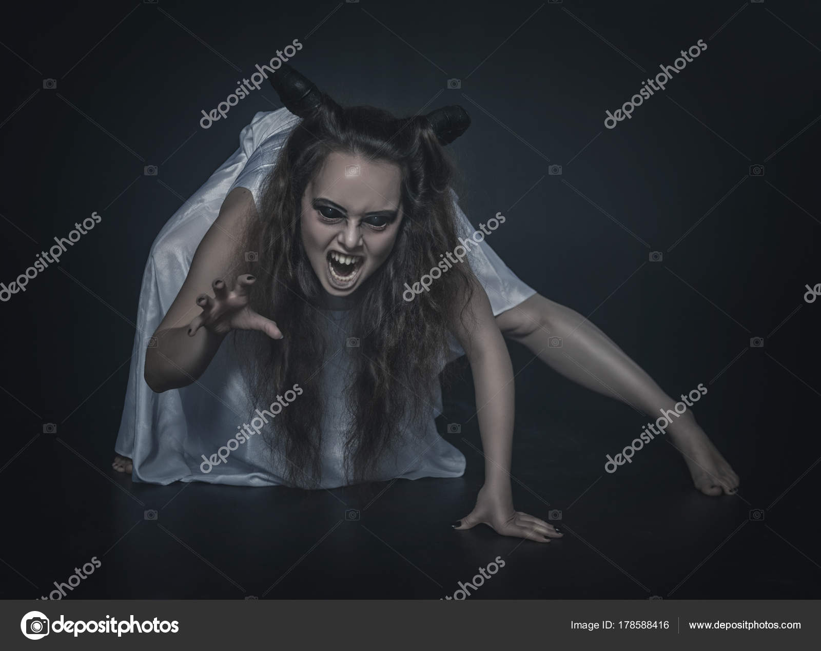 Terrible screaming ghost with horns on dark Stock Photo by ©DarkBird ...