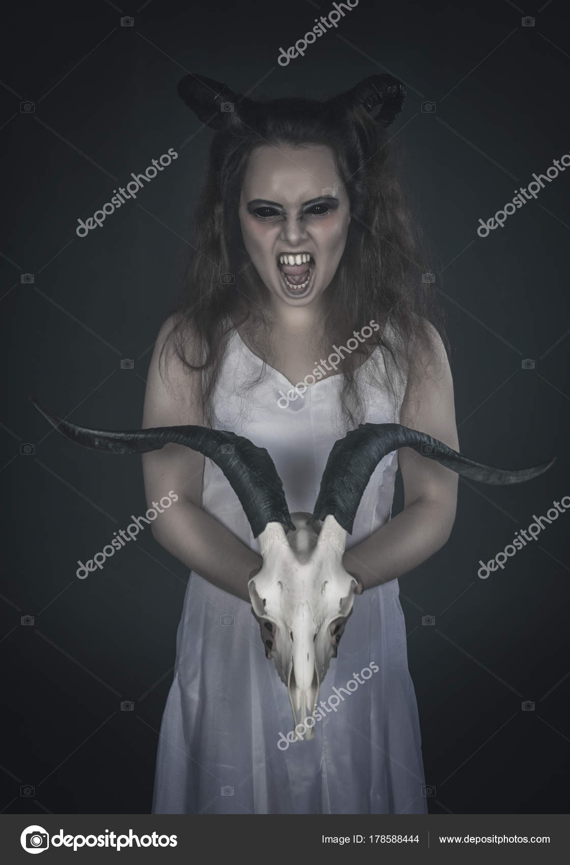 Terrible screaming ghost with skull on dark Stock Photo by ©DarkBird ...