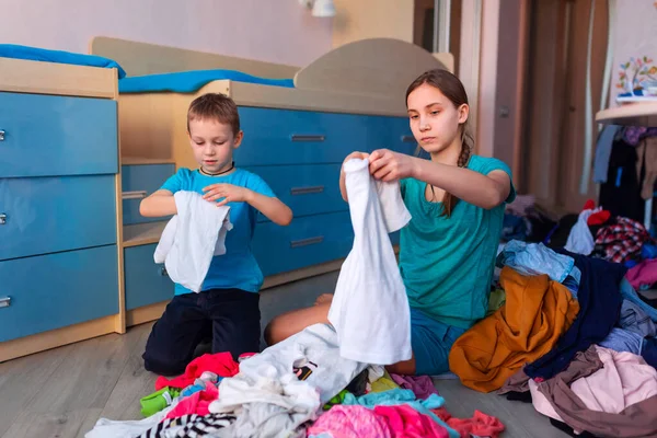 Kids Folding Clothes
