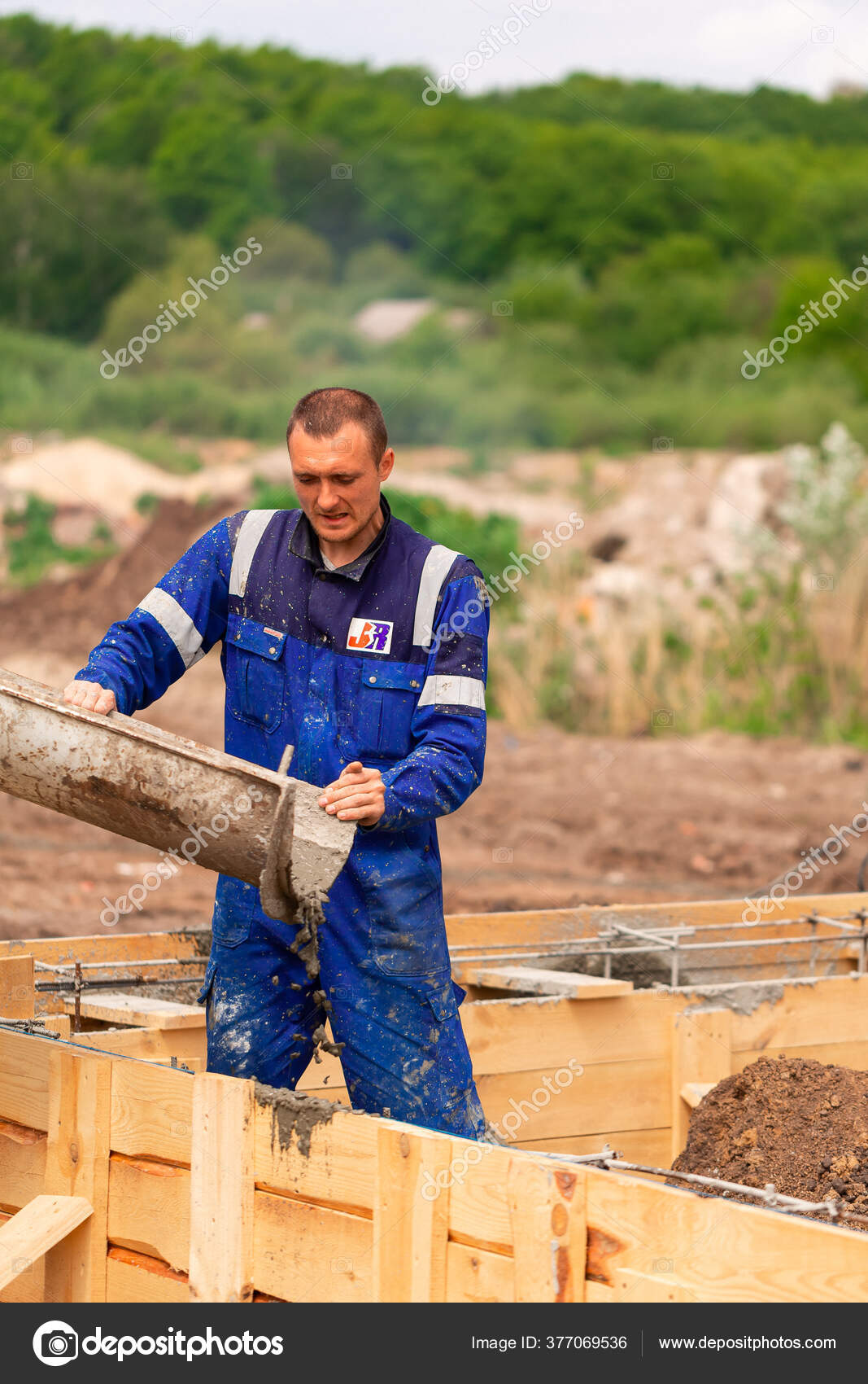 Construction Worker Laying Cement Concrete Foundation Formwork Building ...