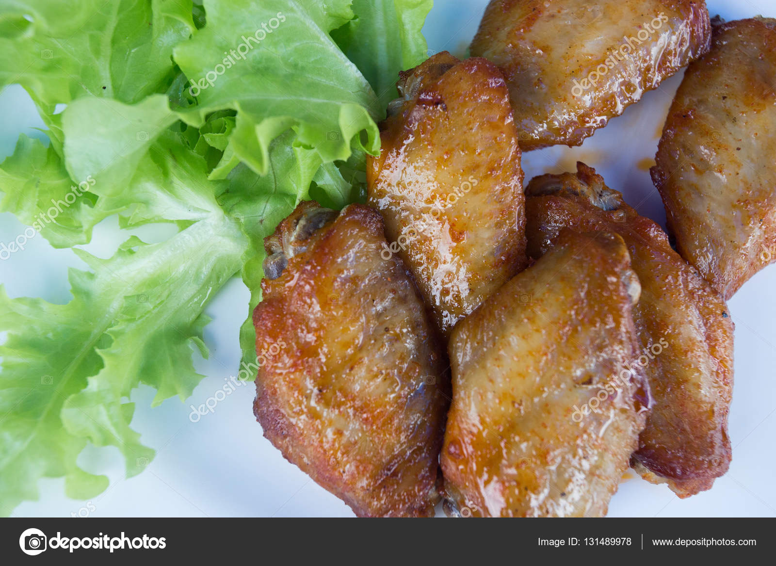 Hot and spicy chicken wing — Stock Photo © ibrave #131489978