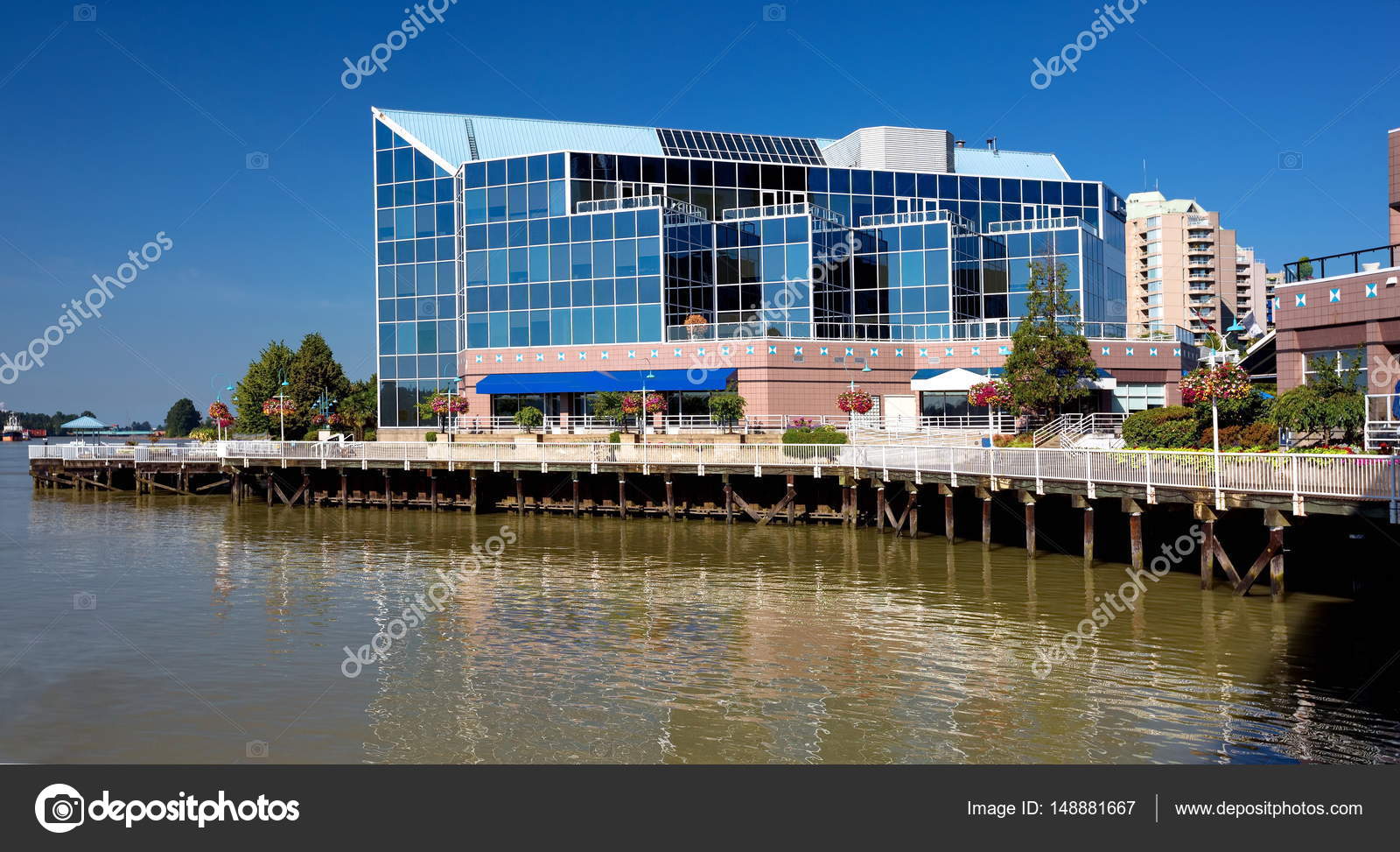 Modern building on the riverfront — Stock Photo © Alex533 #148881667