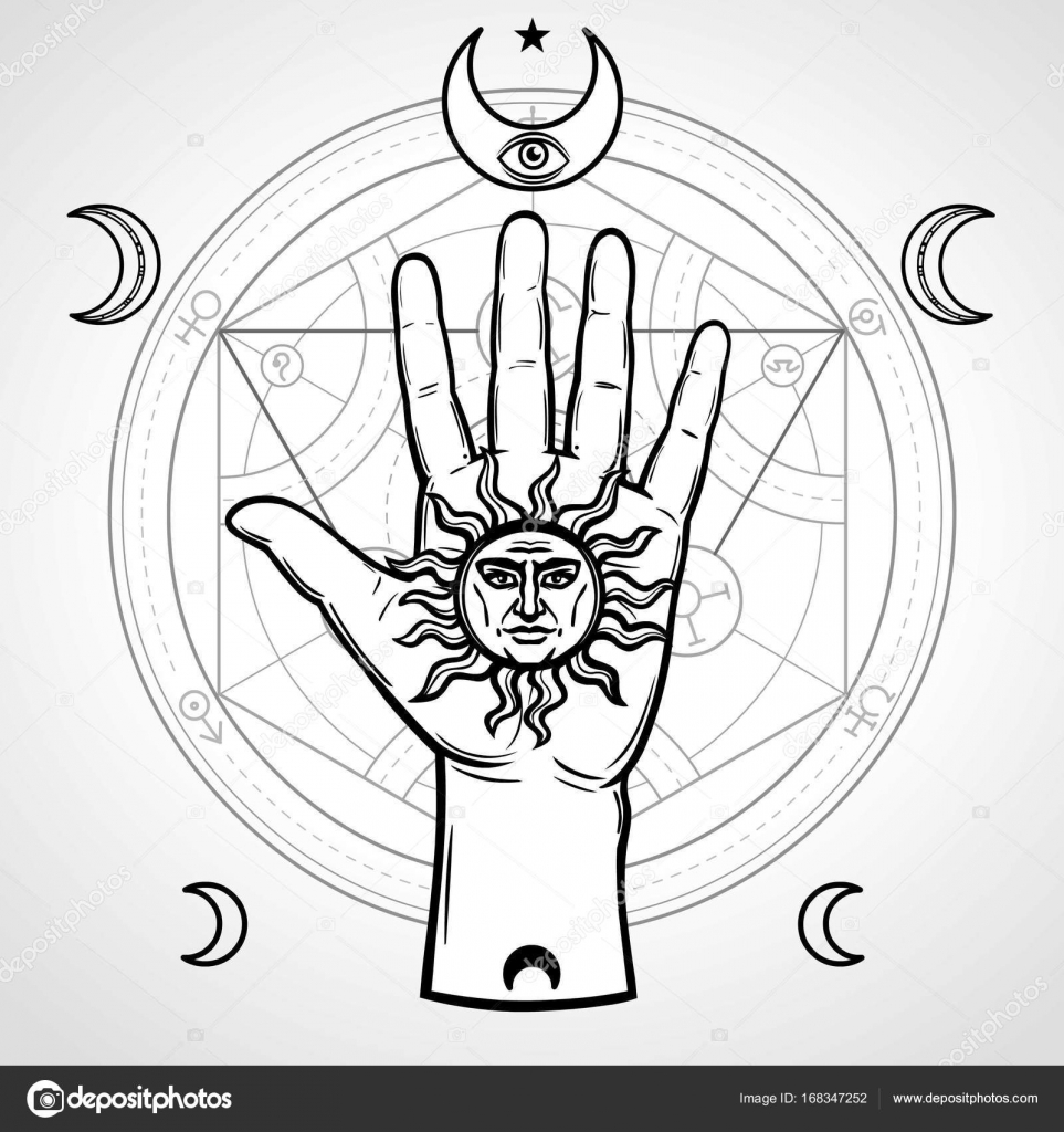 Human hand holds a medieval symbol of the sun. Signs of the moon ...