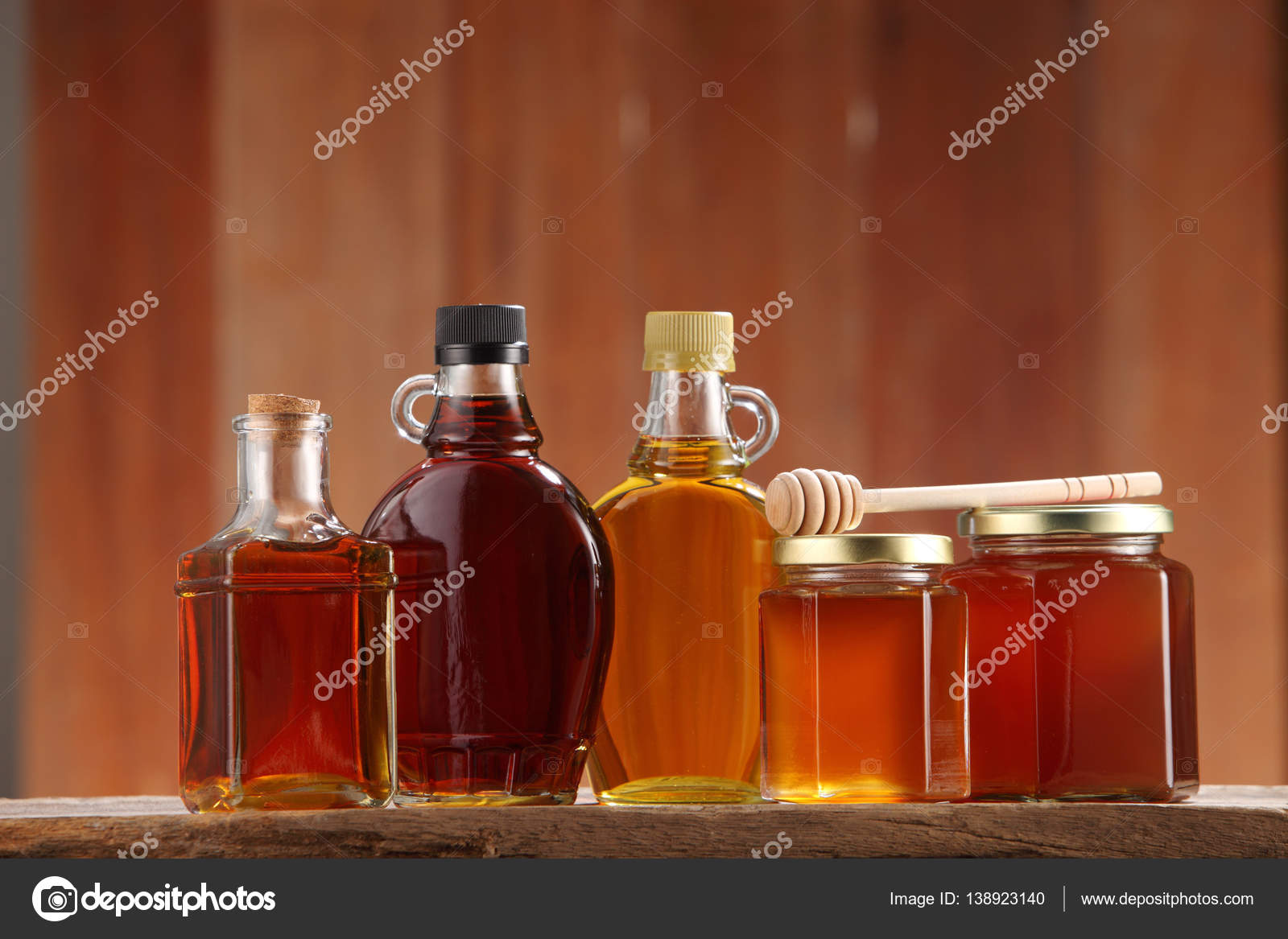 Syrups in bottles and honey Stock Photo by ©eskaylim 138923140