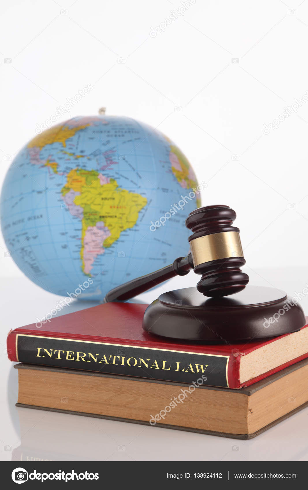 Judge gavel and globe Stock Photo by ©eskaylim 138924112