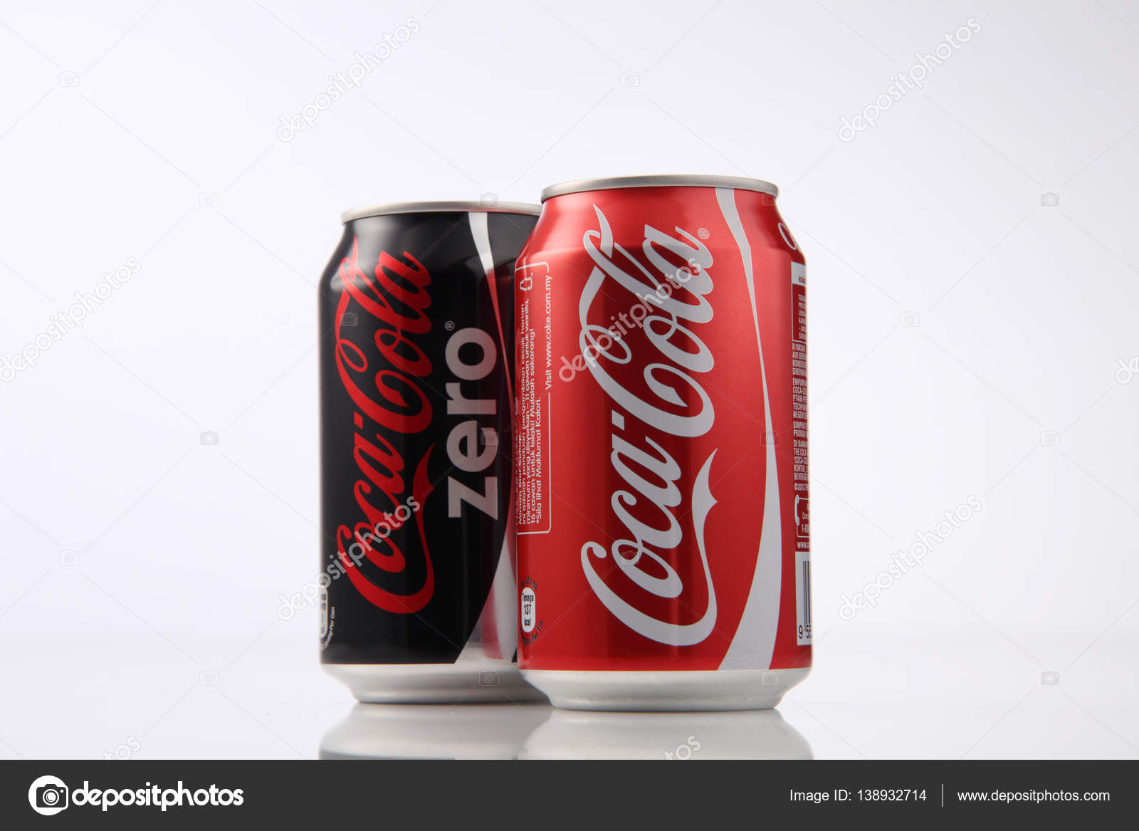 Coca cola drink in cans — Stock Editorial Photo © eskaylim #138932714