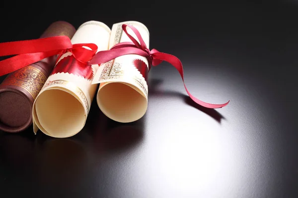 Roll certificate with ribbon Stock Photo by ©eskaylim 138923664