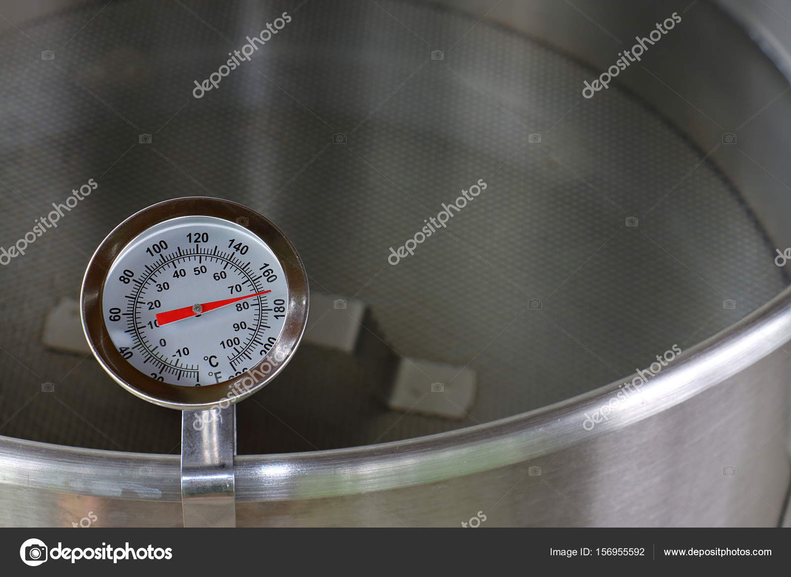 Dial Thermometer in Heating Water Stock Photo by ©rasilja 156955592