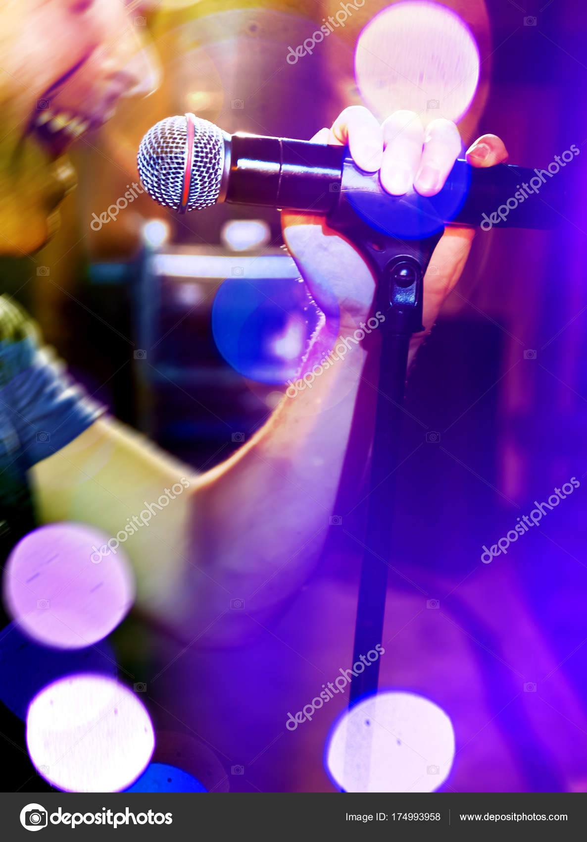 Musical background.Mic and singer Stock Photo by ©carloscastilla 174993958
