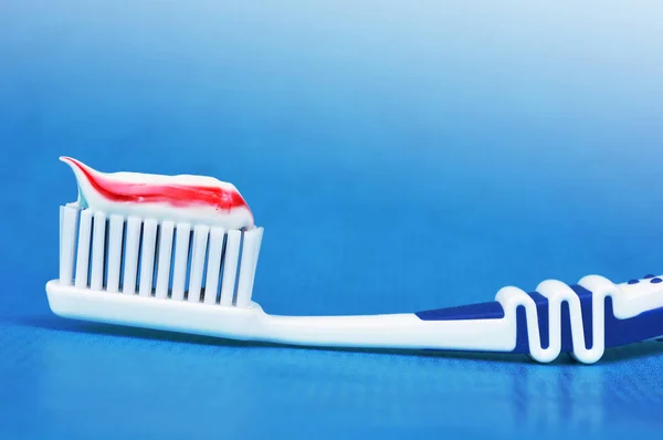 Toothbrush with toothpaste — Stock Photo © nixki #130691858