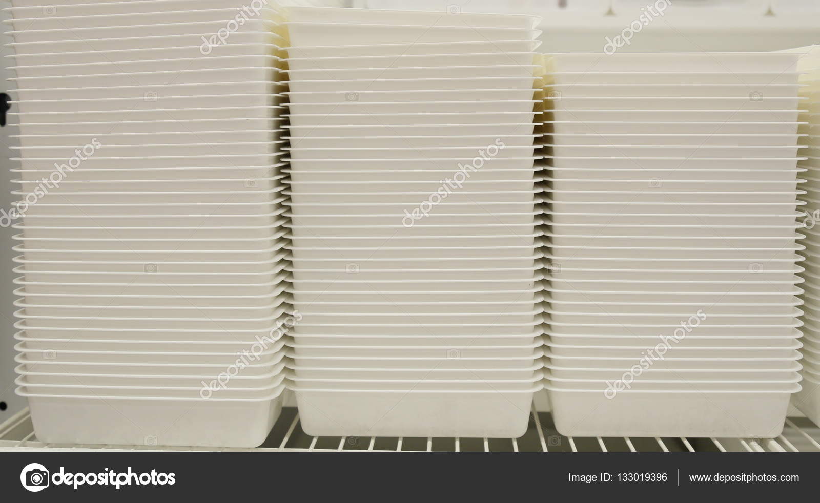 Stacked empty plastic box Stock Photo by ©flytosky11 133019396