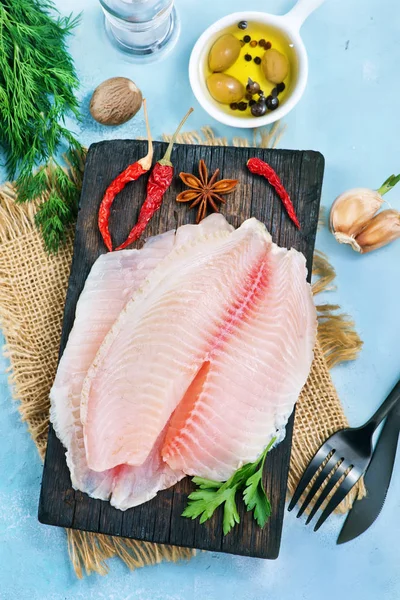 Raw fish fillet — Stock Photo © tycoon #139977826