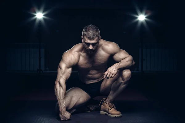 Male bodybuilder, fitness model Stock Photo by ©MrGarry 153348374