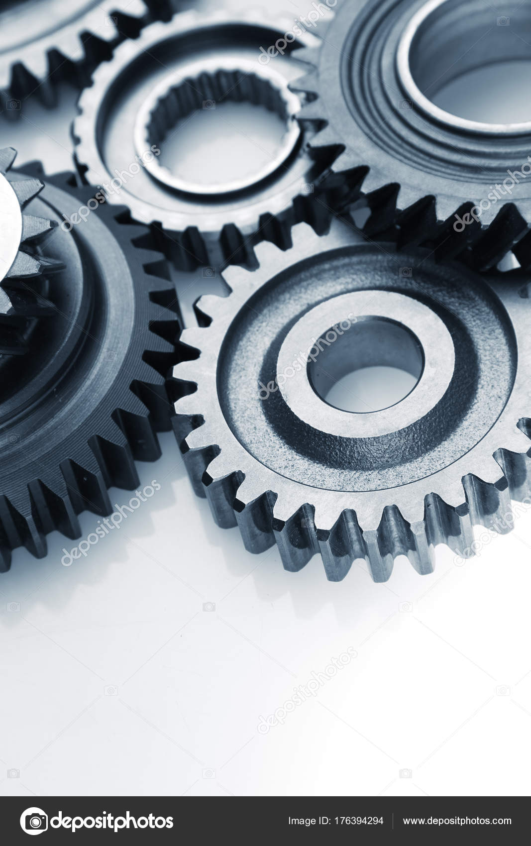 Steel cogs together Stock Photo by ©stillfx 176394294