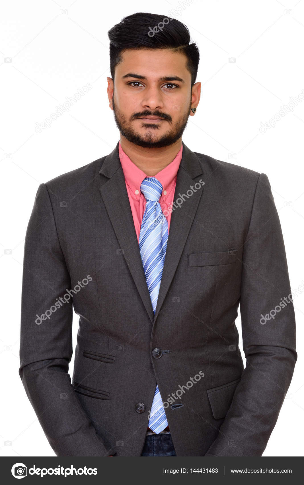 Young handsome Indian businessman — Stock Photo © amazingmikael #144431483 Young handsome Indian businessman — Stock Photo © amazingmikael #144431483