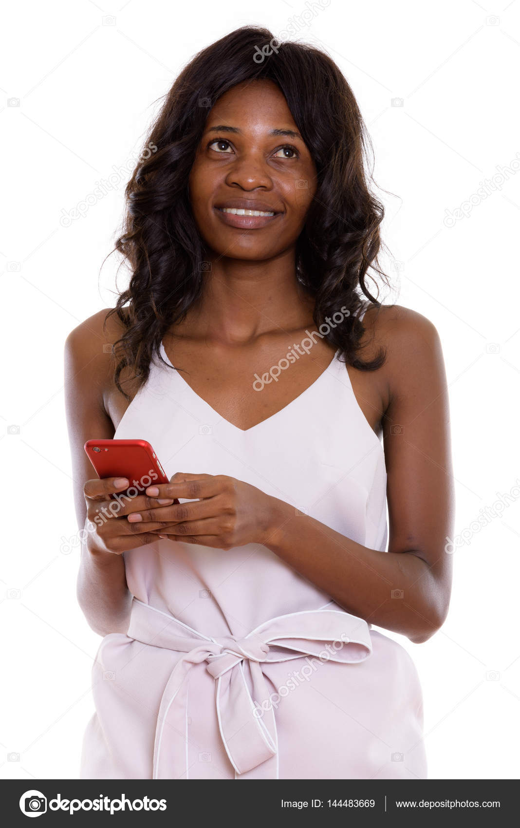 Studio shot of young happy black African businesswoman smiling w ... Studio shot of young happy black African businesswoman smiling w ...