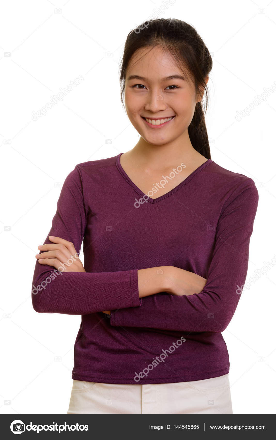 Young happy Asian teenage girl smiling — Stock Photo © amazingmikael ...