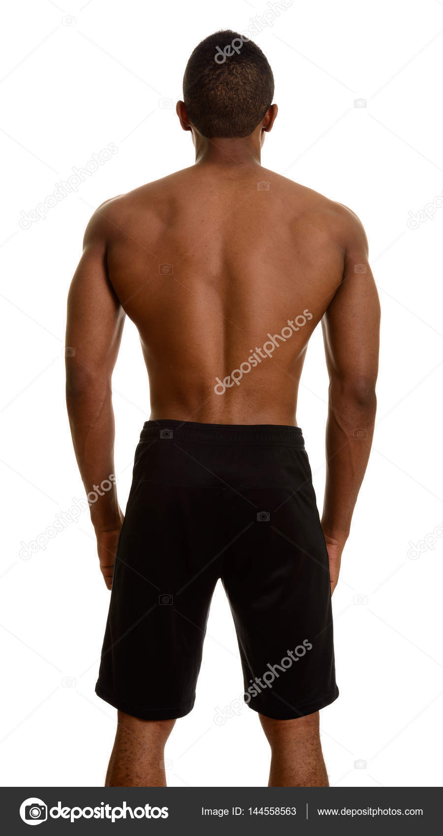 Back view of young handsome African man shirtless with defined m ...
