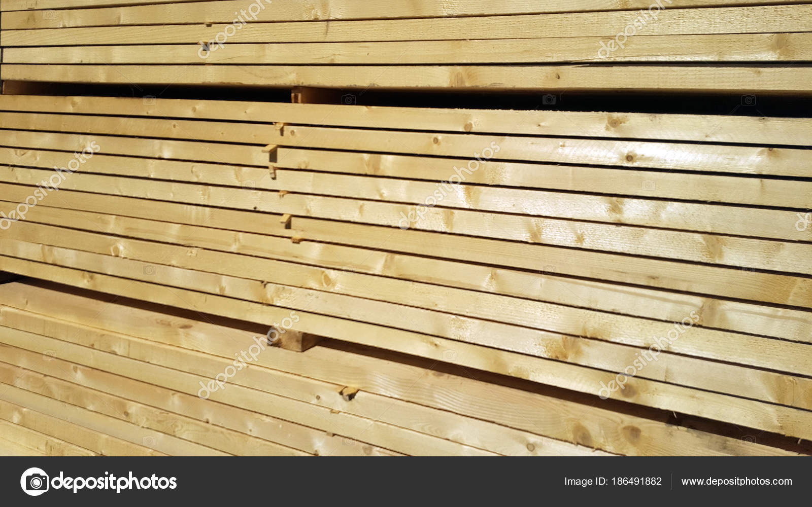 Wood timber construction material Stock Photo by ©roxanabalint 186491882