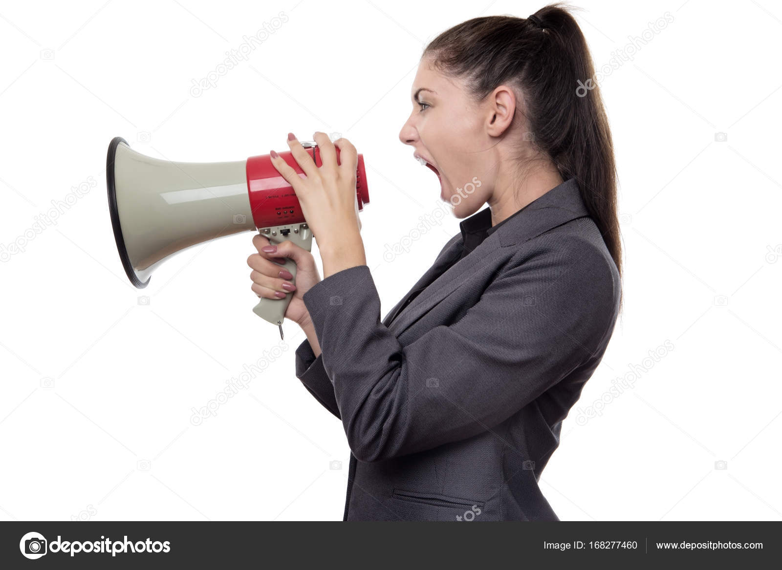 Woman shouting down a bullhorn Stock Photo by ©jayfish 168277460