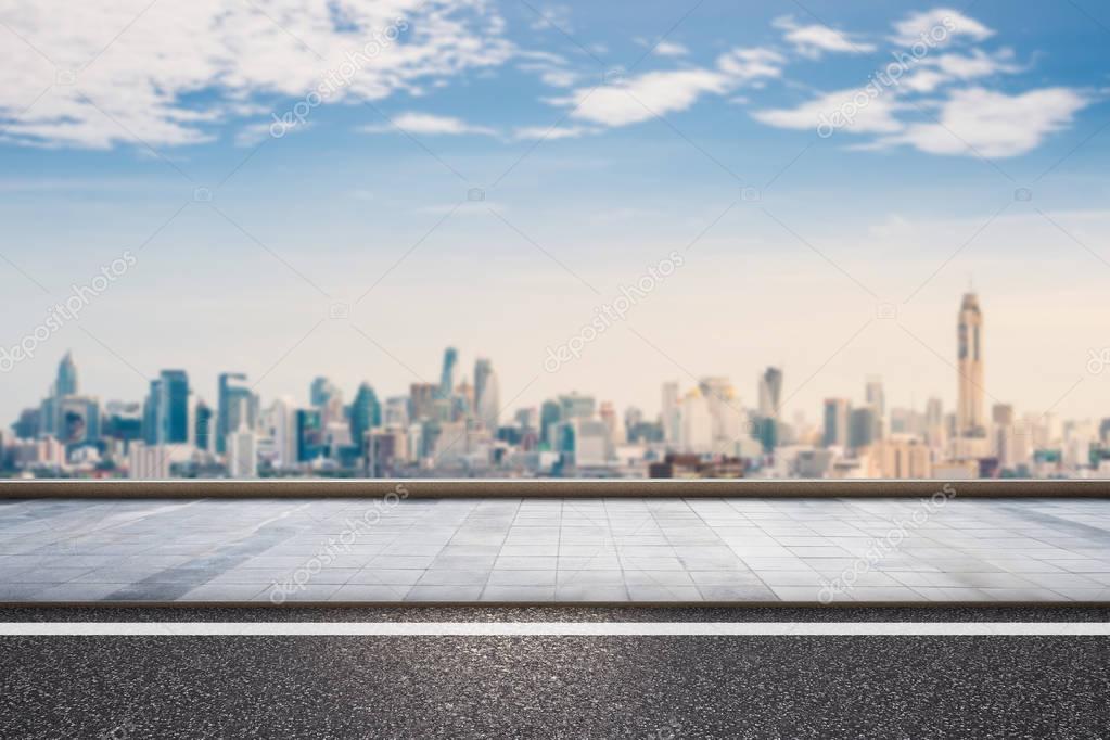 Roadside with cityscape background — Stock Photo © phonlamai #135570192
