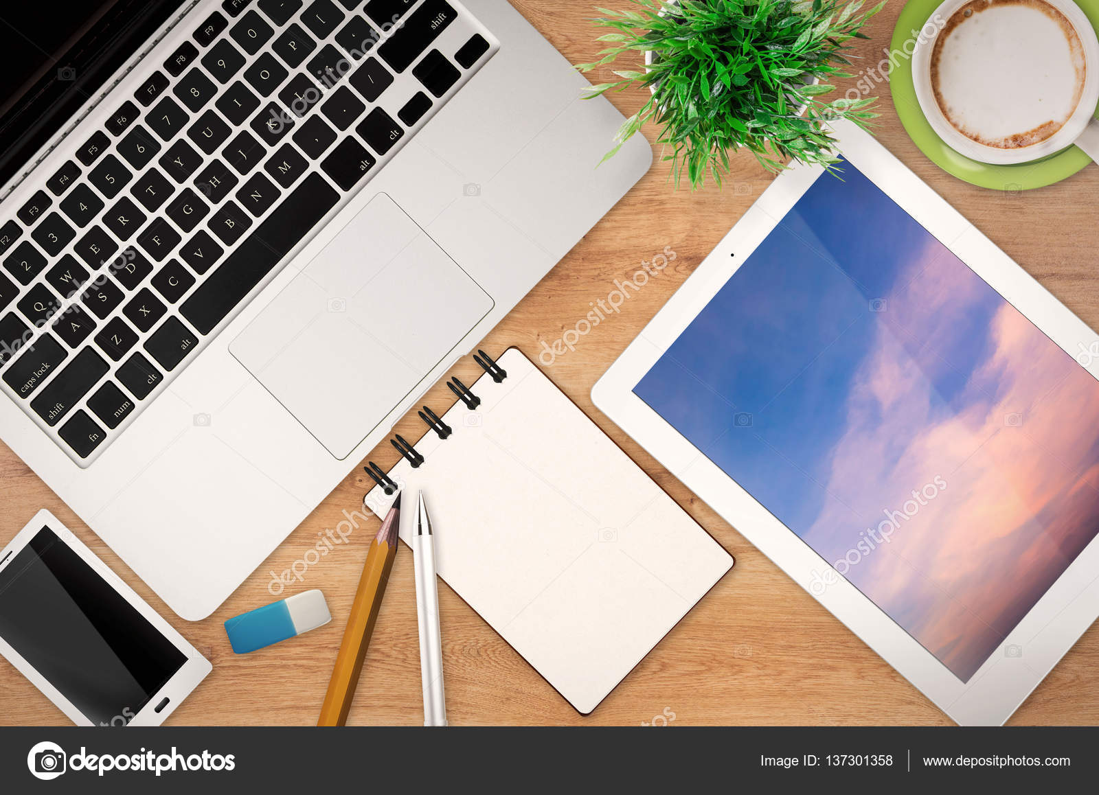 Messy office desk top view Stock Photo by ©phonlamai 137301358