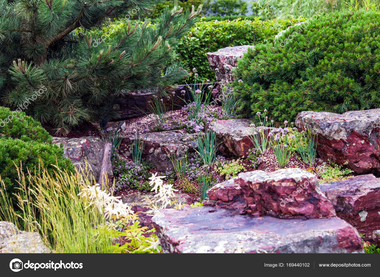 Alpine slide in landscape design Stock Photo by ©prescott10 169440102