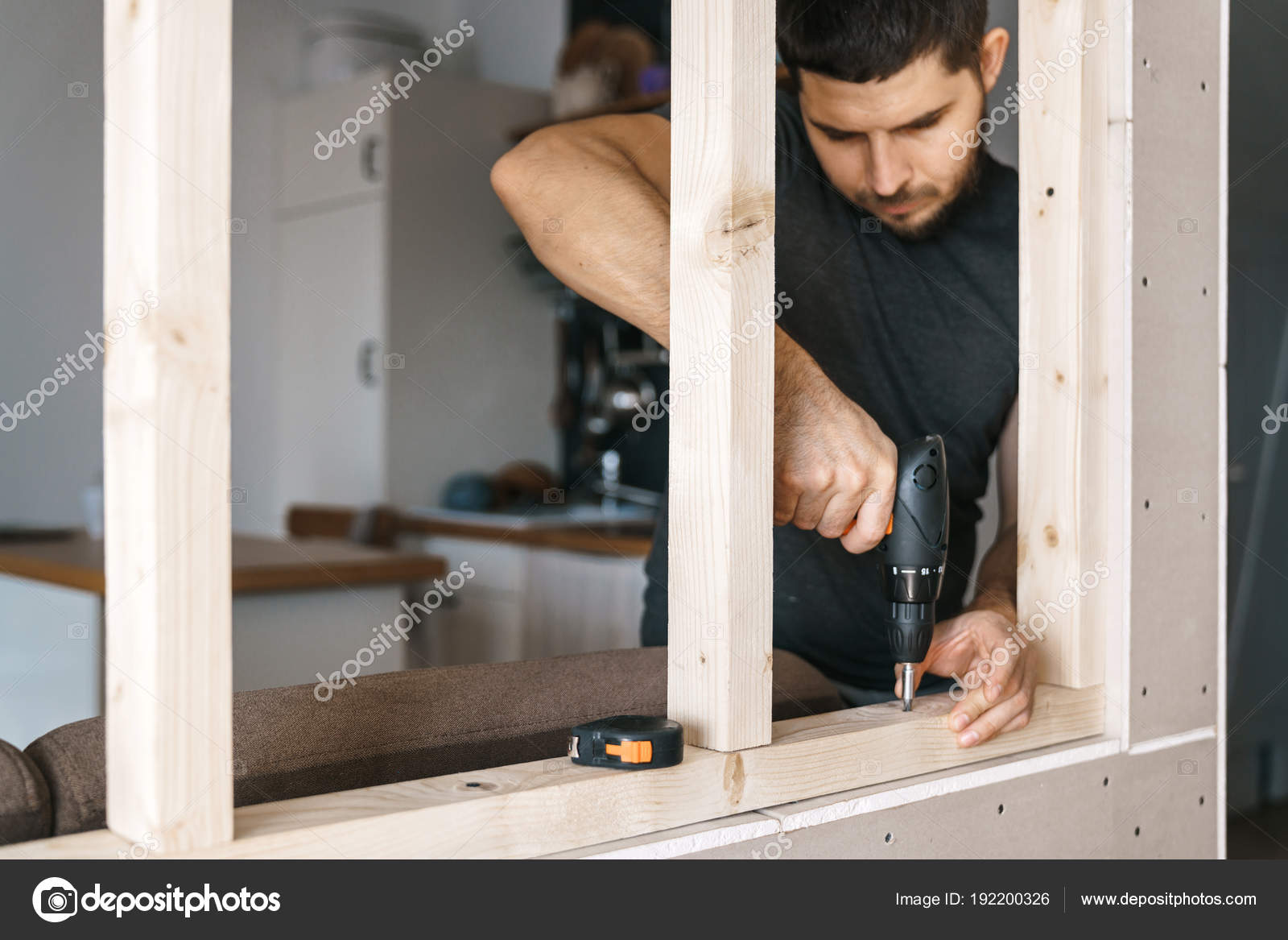 Man Works Screwdriver Fixing Wooden Frame Window Gypsum Plasterboard ...