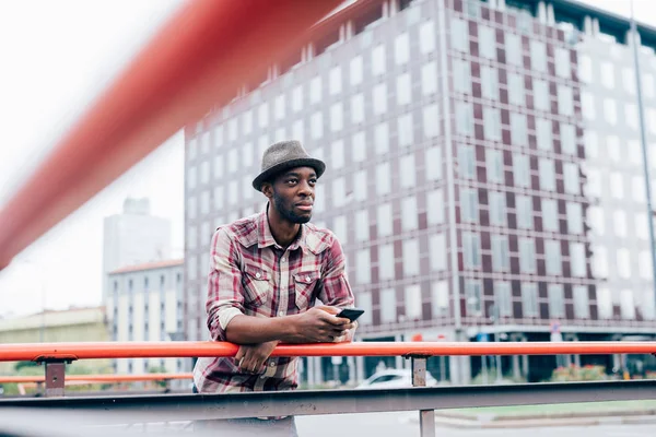 Young handsome afro black man Stock Photo by ©peus 90303780