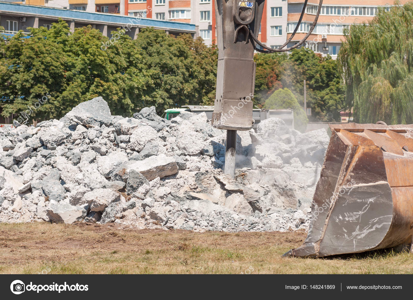 Machine to crush concrete in the city street — Stock Photo © Tanchic ...