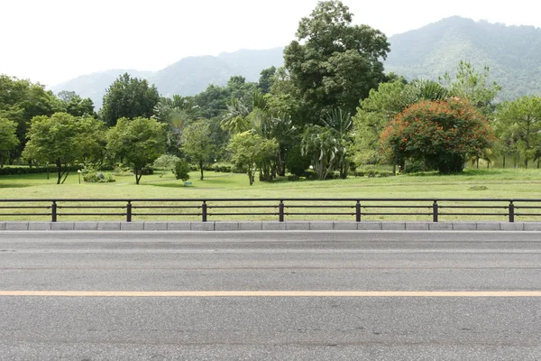 Road garden background — Stock Photo © Kris #33689467