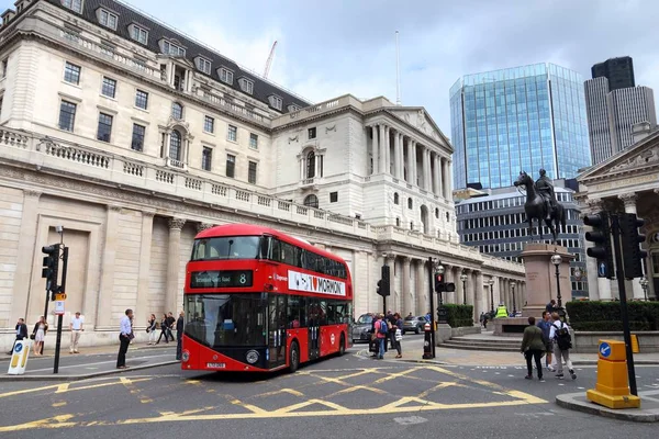 London, England - Iconic red double decker bus on the move with the ...