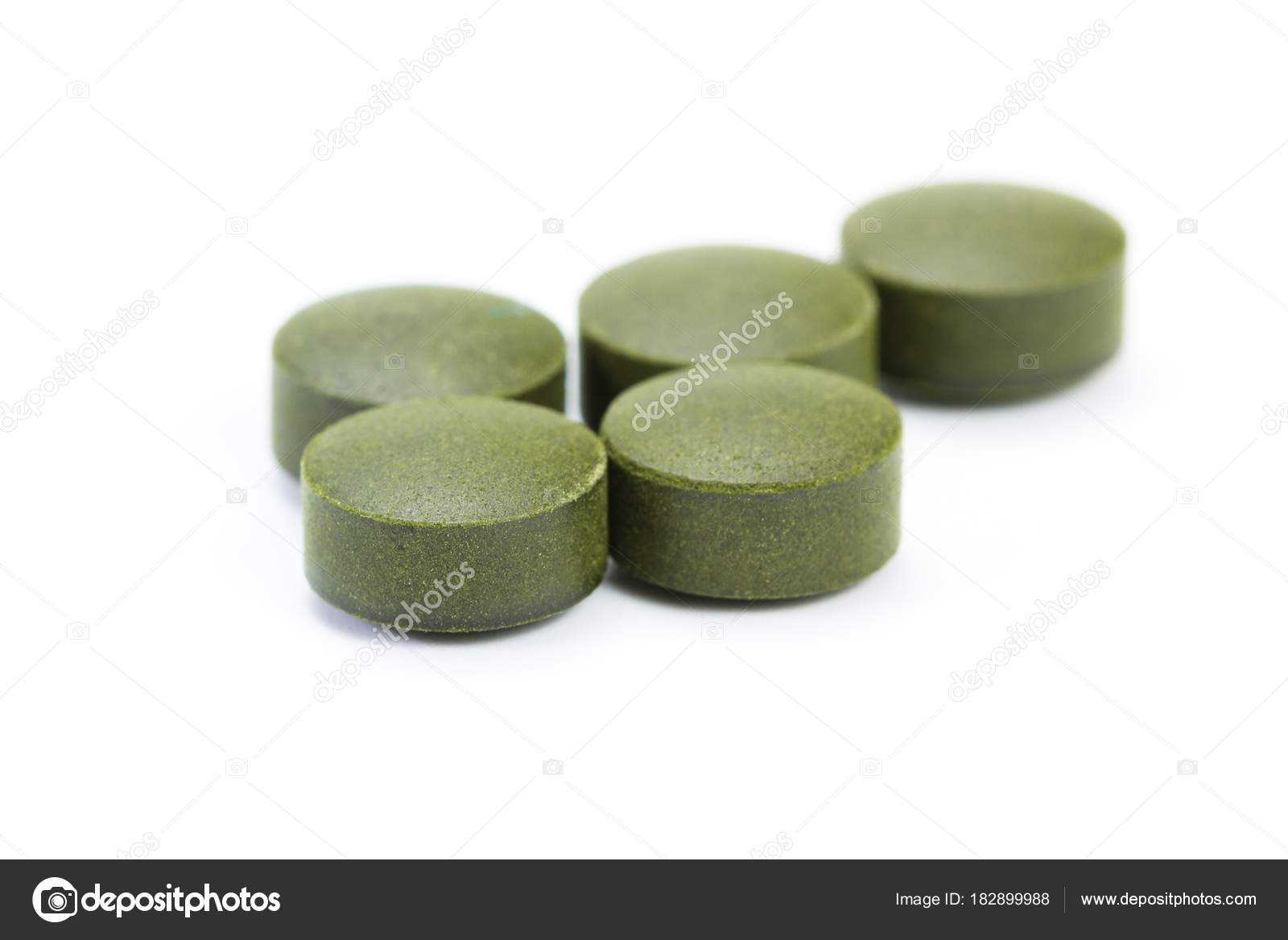 Fermented chlorella tablets Stock Photo by ©wollertz 182899988