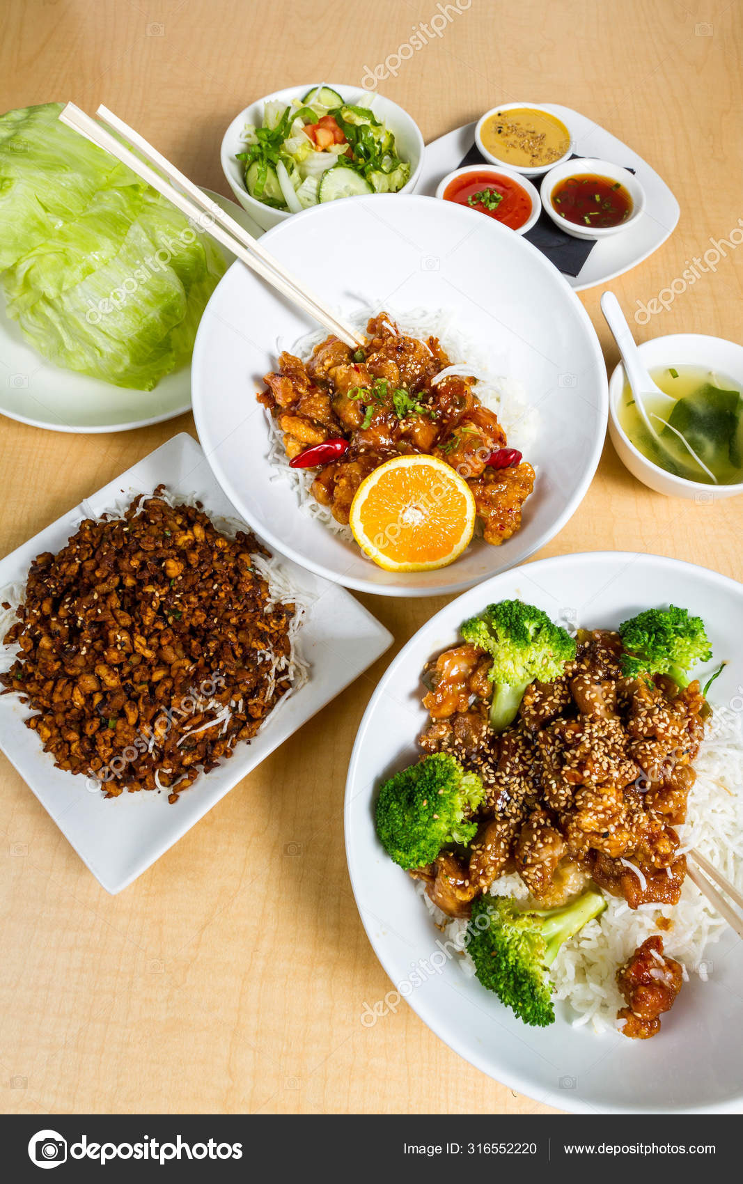 Pan Asian food in a restaurant Stock Photo by ©wollertz 316552220