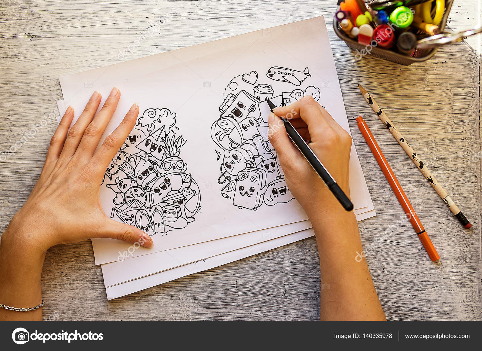 The process of drawing doodles with a pen. Antistress drawing, painting ...