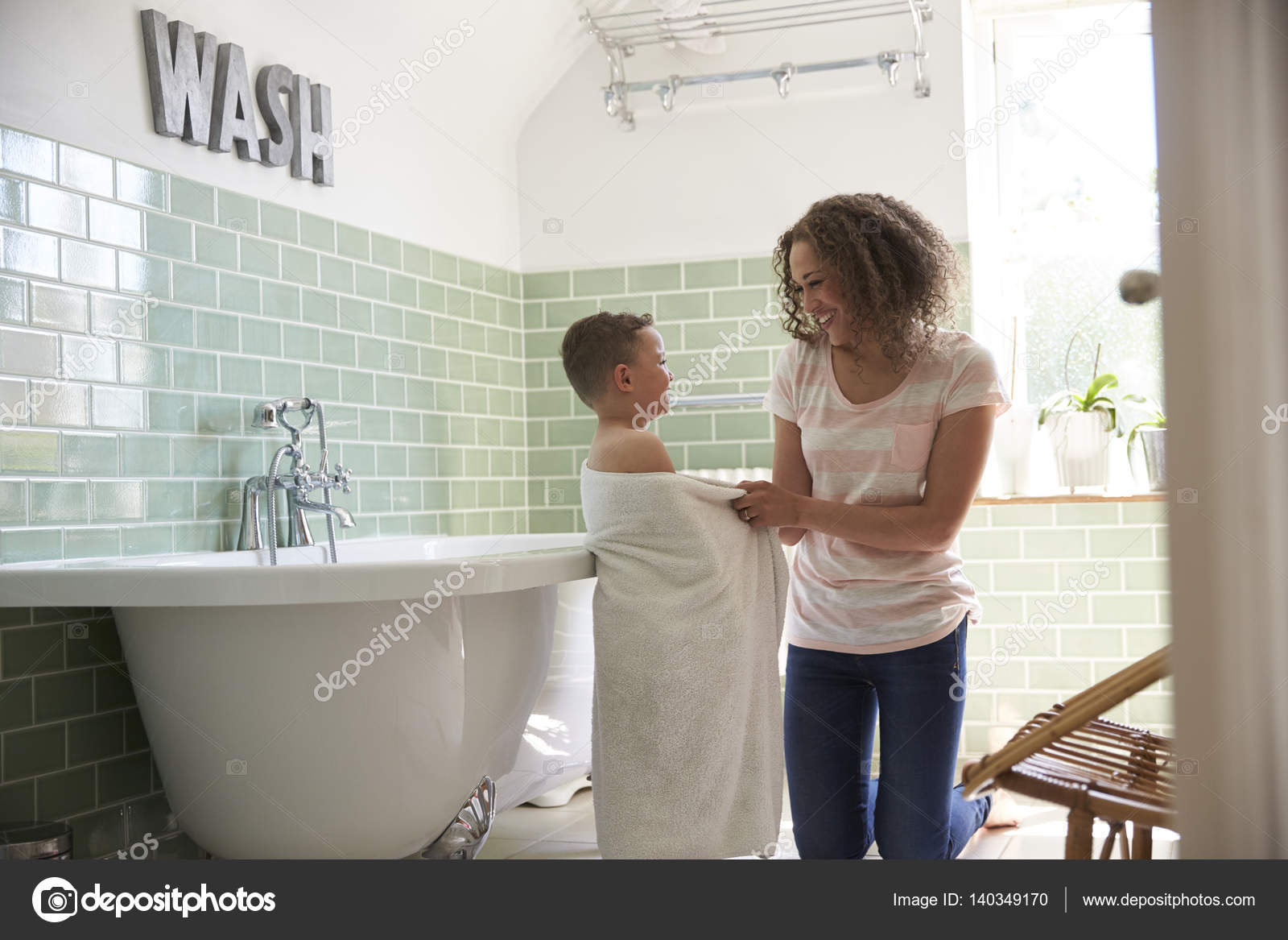 Mother Drying Son With Towel Stock Photo by ©monkeybusiness 140349170